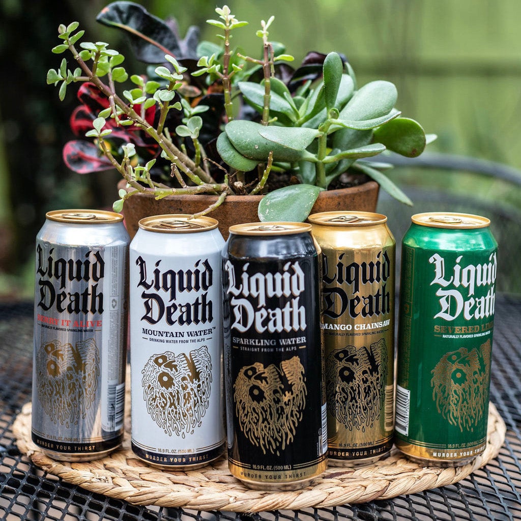 liquid death water | GOLDEN DINOSAURS